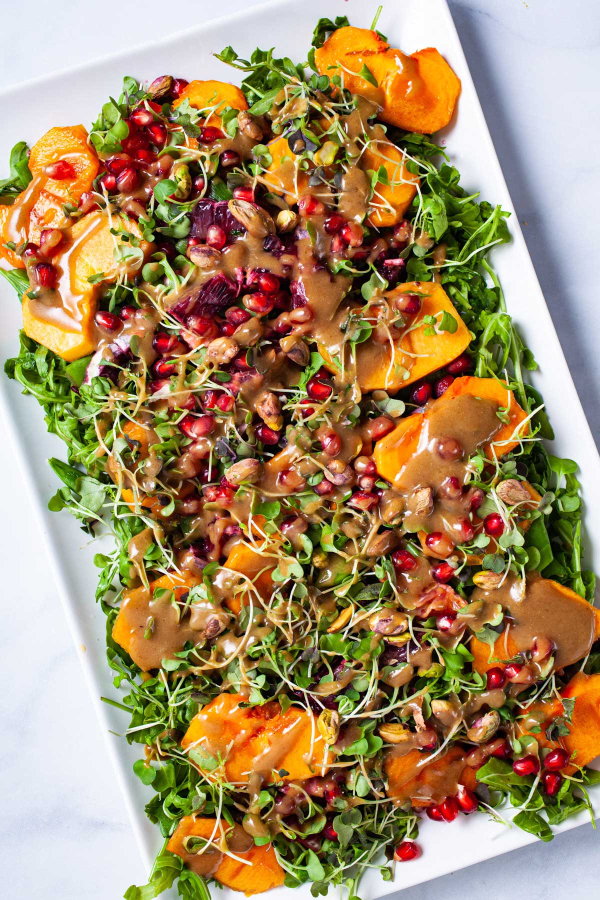 Arugula Persimmon Salad with Tahini Dressing - My Chef’s Apron